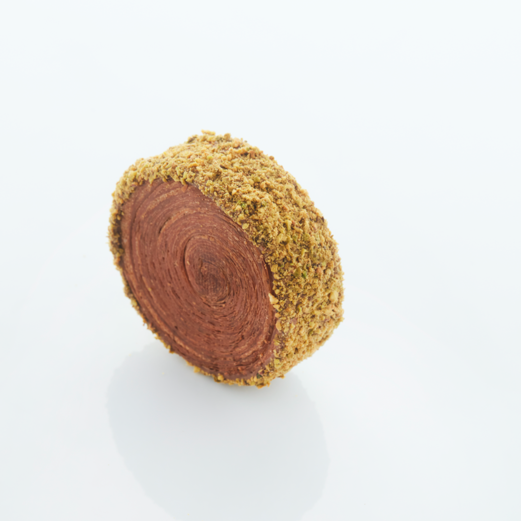 Rotterdamse Rol Gevulde Croissant Witte Chocolade & pistache | Bakkit